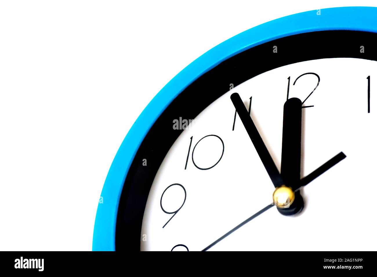 Blue wall clock isolated on white background Stock Photo - Alamy