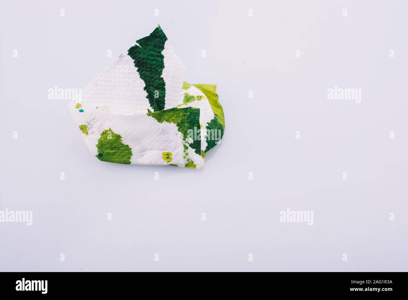 Stained tissue after wiped the green paint off Stock Photo - Alamy