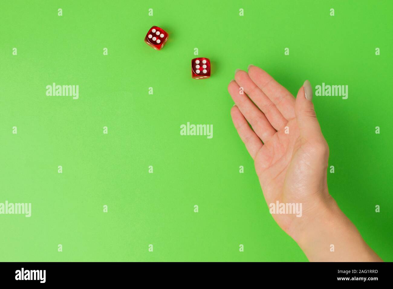 Woman Hand Rolling Dice