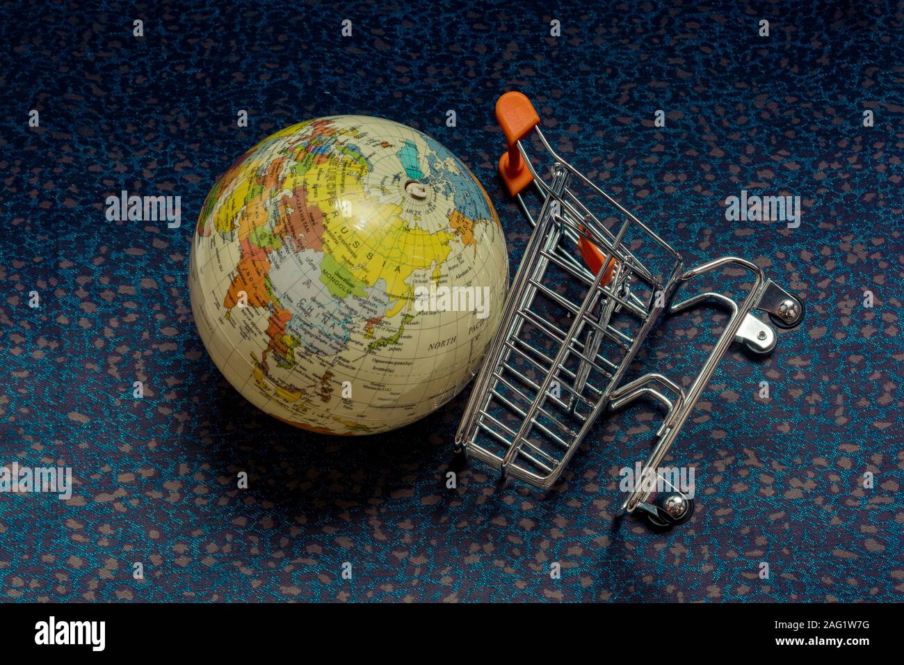 World Globe and Shopping cart or shopping trolley as business concept ...
