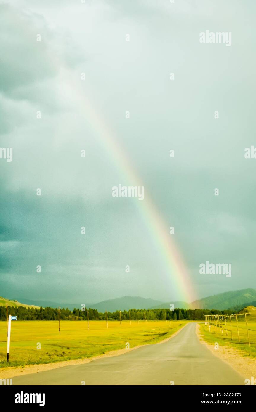 Summer spring rain rainbow above hi-res stock photography and images ...
