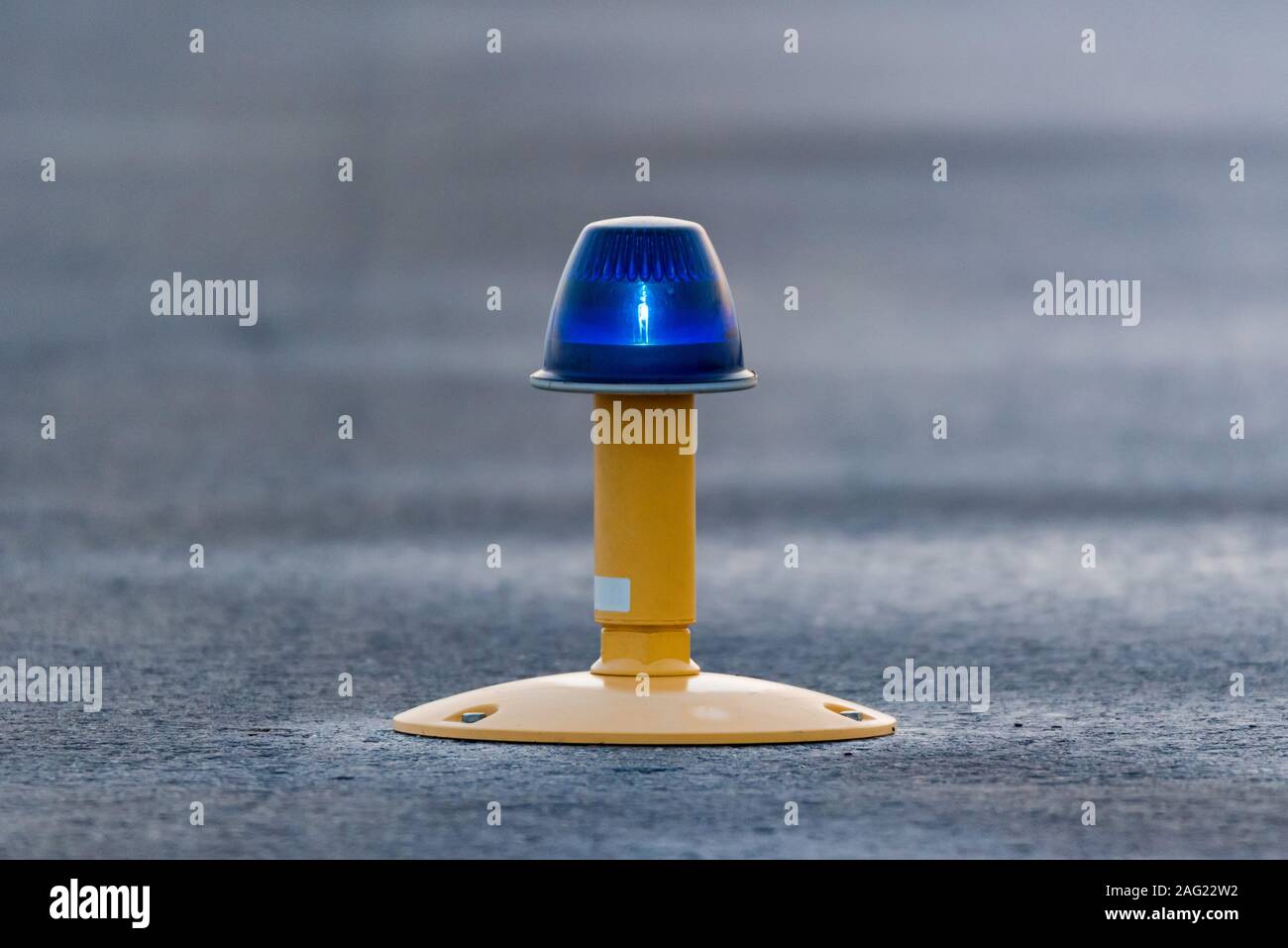 Close view of blue signal light on landing line in airport Stock Photo ...
