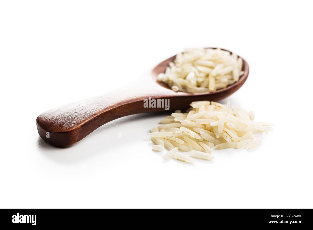 Uncooked indian long rice isolated on white background Stock Photo - Alamy