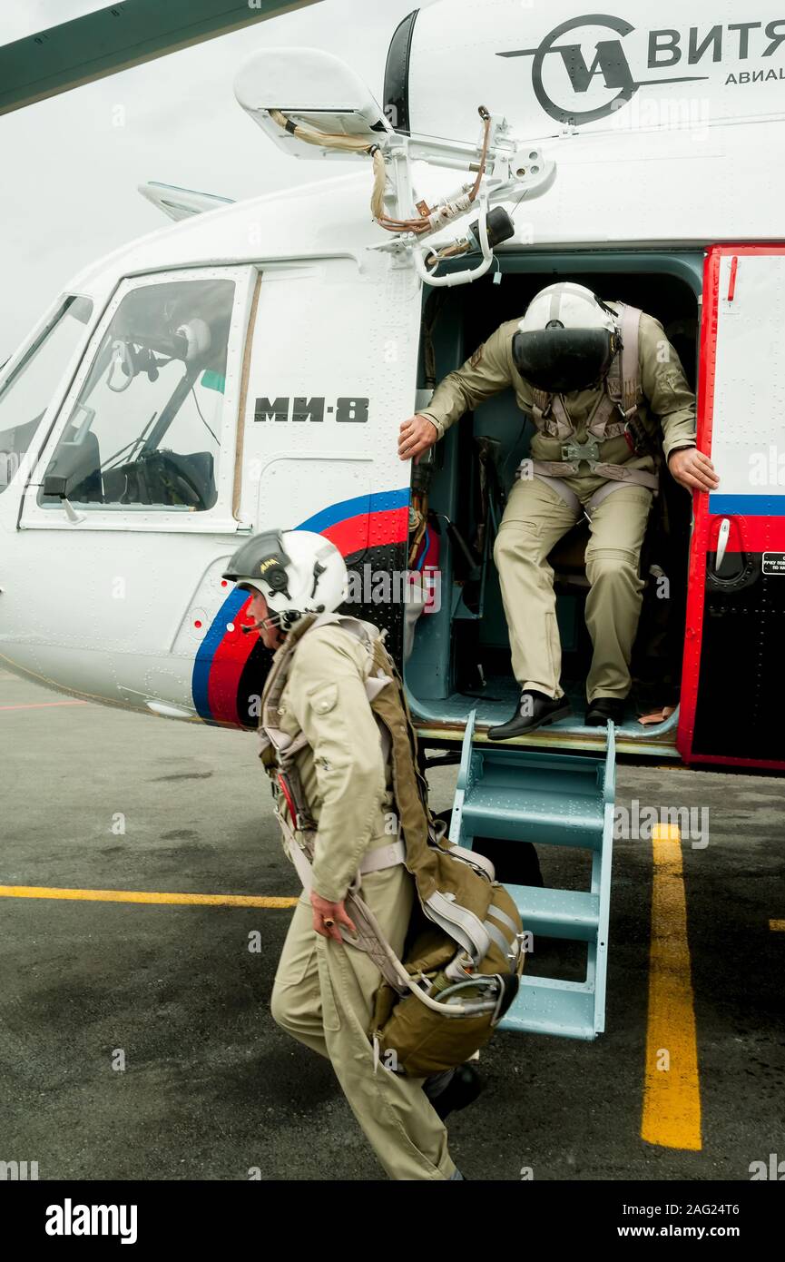 Pilots before flight in MI-8 helicopter Stock Photo - Alamy