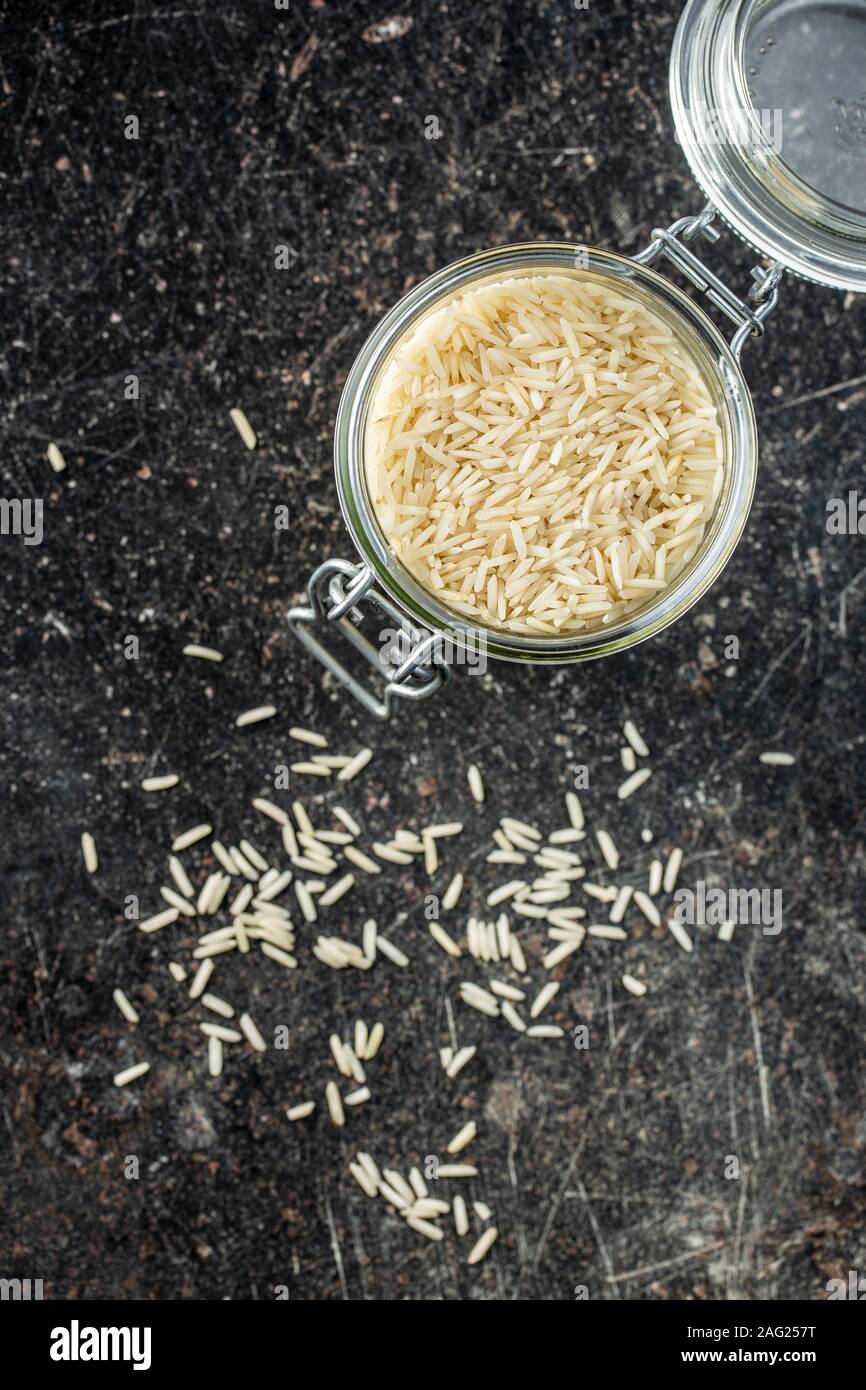 Uncooked indian long rice in jar. Top view Stock Photo - Alamy