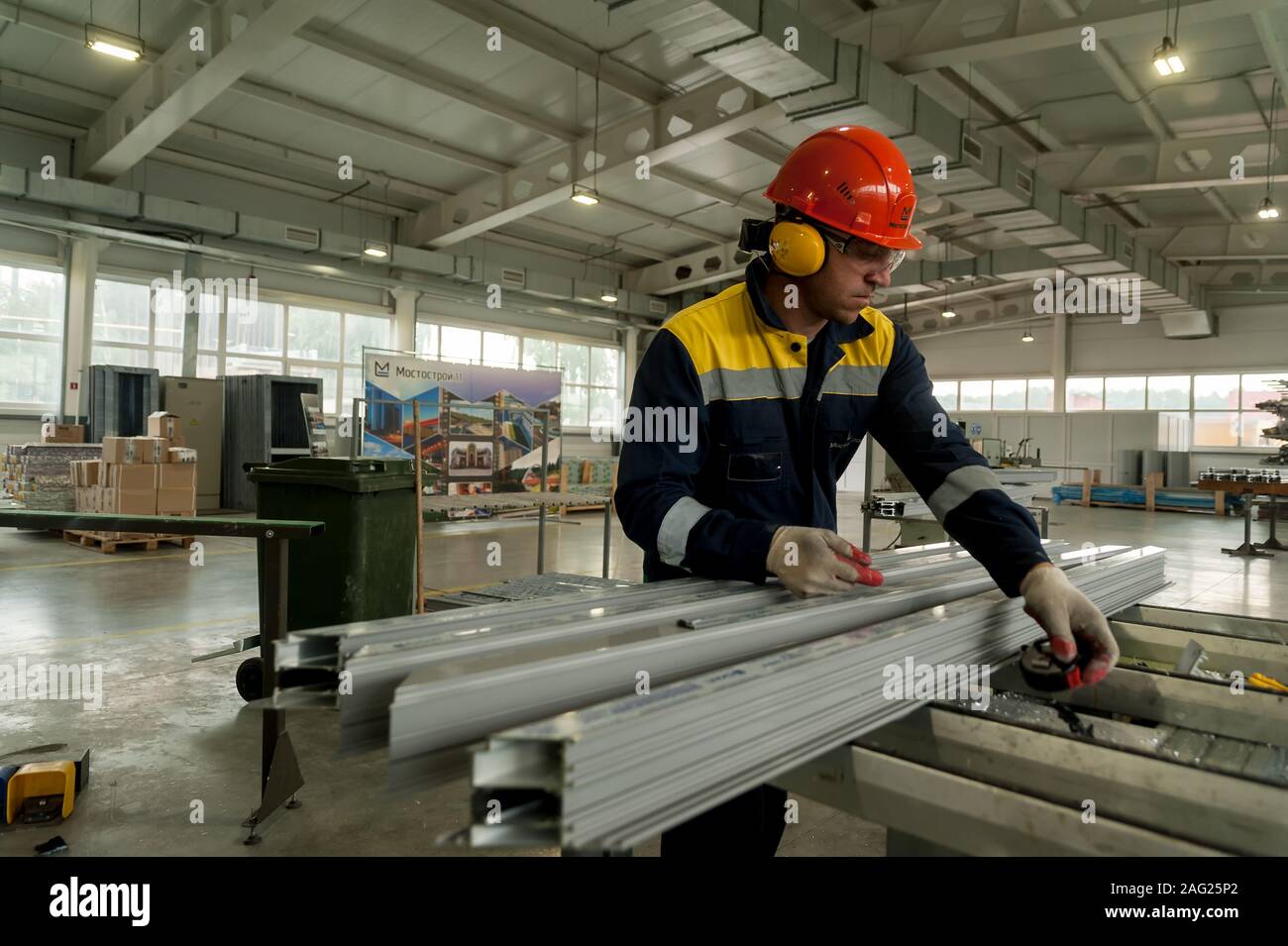 Worker manufacturing plastic window assembly hi-res stock photography ...