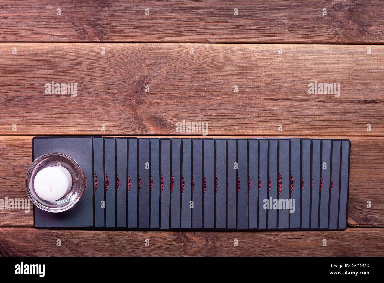 Fortune telling cards on a wooden table. Top view, place for text ...
