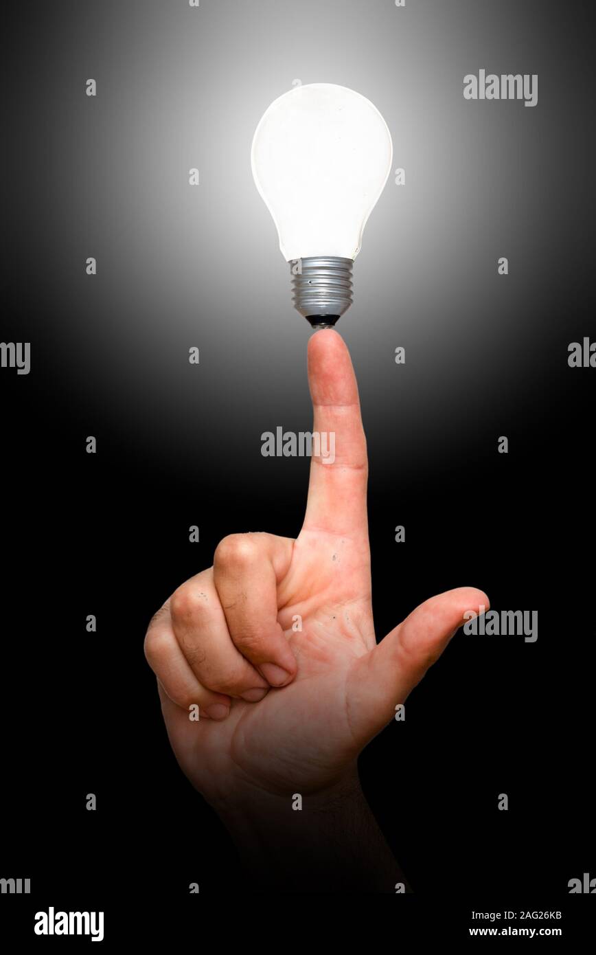 Lamp on finger Stock Photo - Alamy