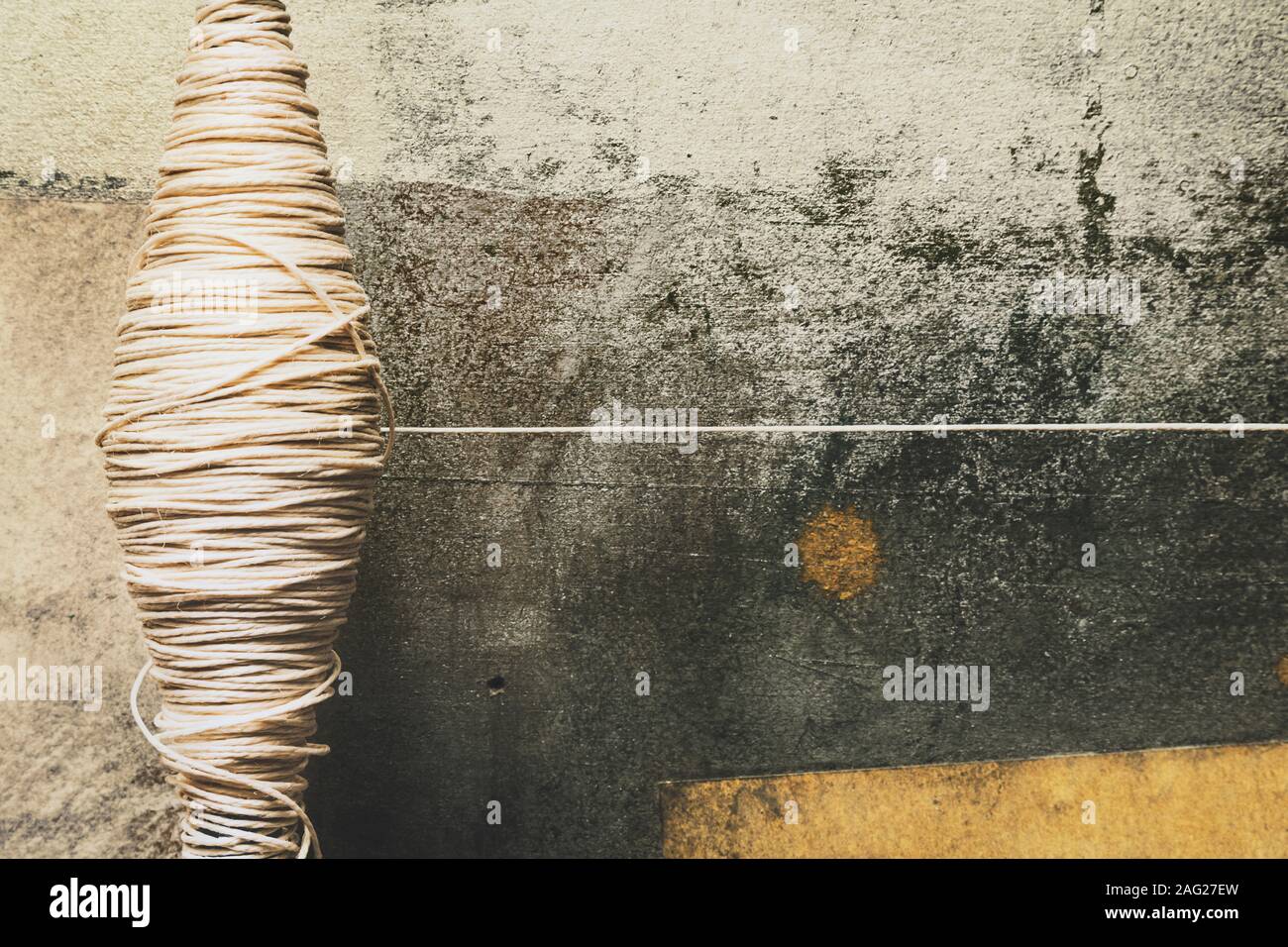 Cotton spool wall hi-res stock photography and images - Alamy