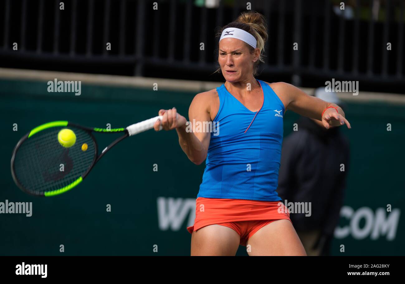 Conny Perrin of Switzerland in action during her first-round match at ...