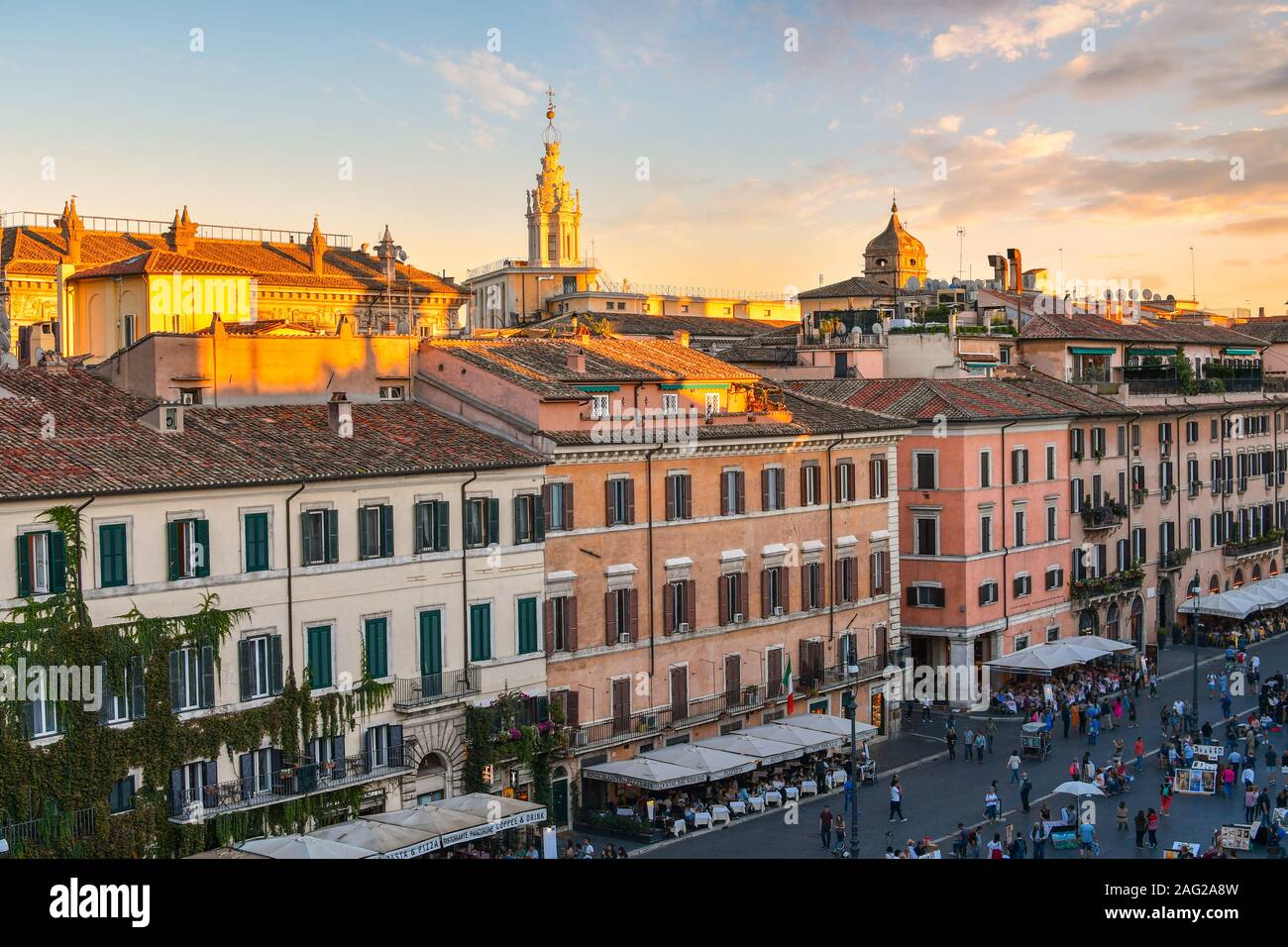 Sunlight hits the towers and rooftops over the Piazza Navona as ...