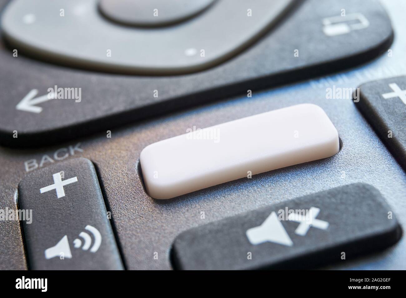 Dark smart tv remote control mock up with blank white button and copy ...