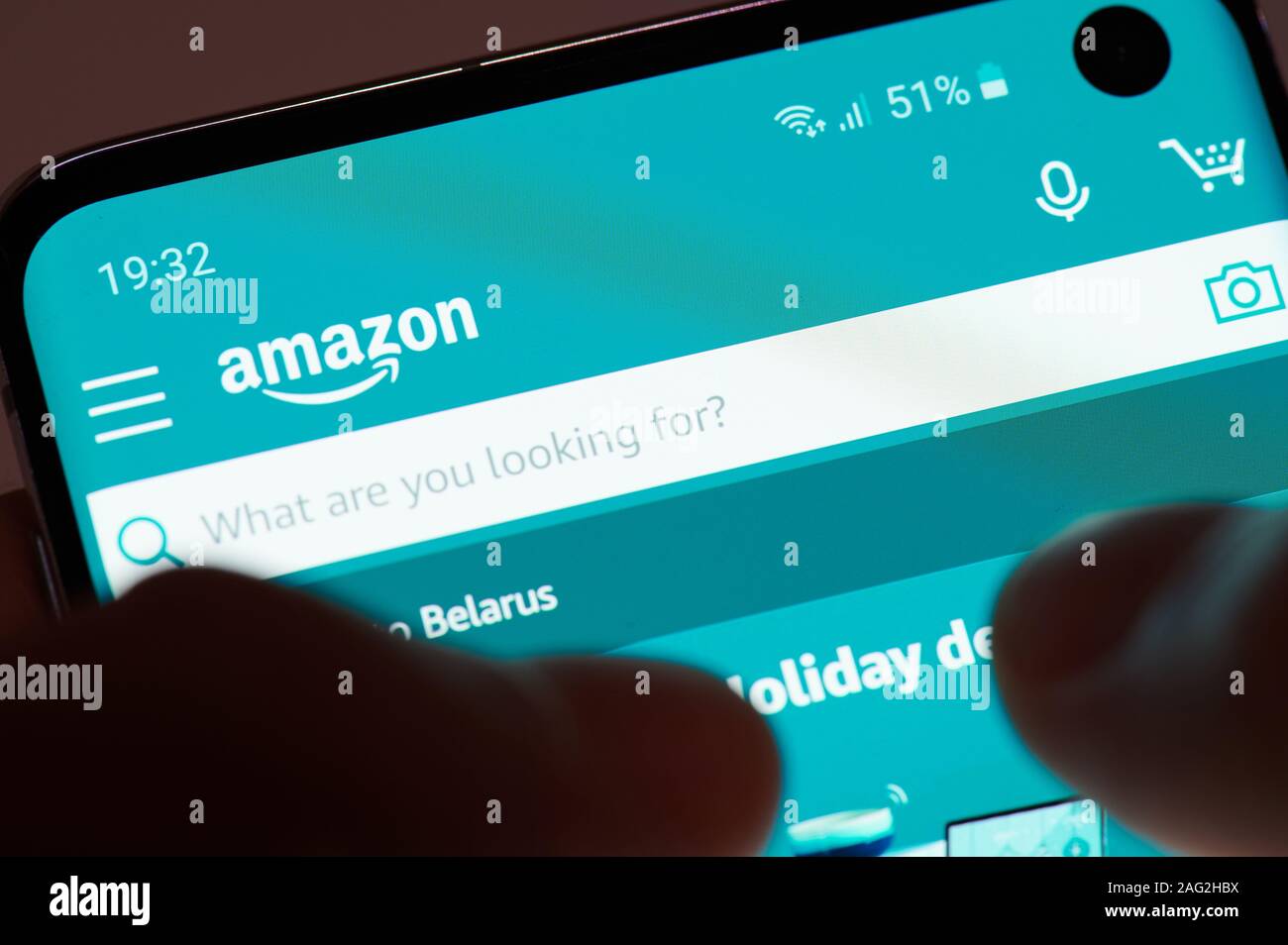 New york, USA - december 17, 2019: Using Amazon shop app on smartphone ...