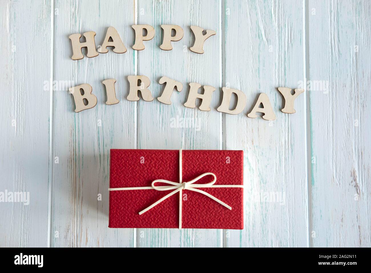 Happy Birthday. Greeting inscription from wooden letters on a light ...