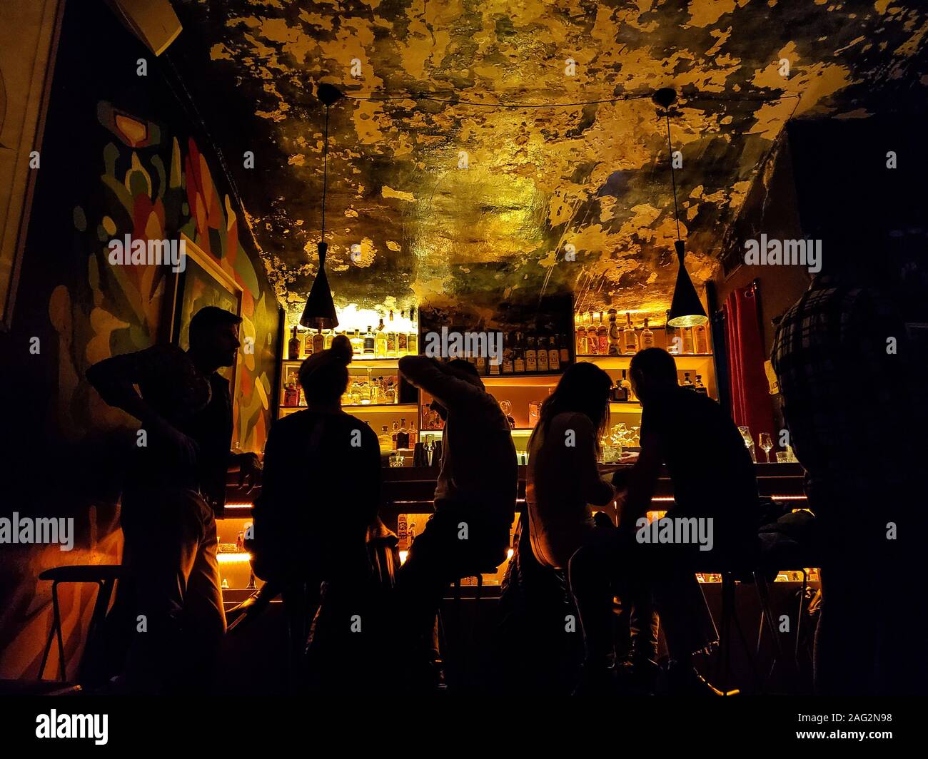 Group of people drinking at bar in night time,nightlife atmosphere ...