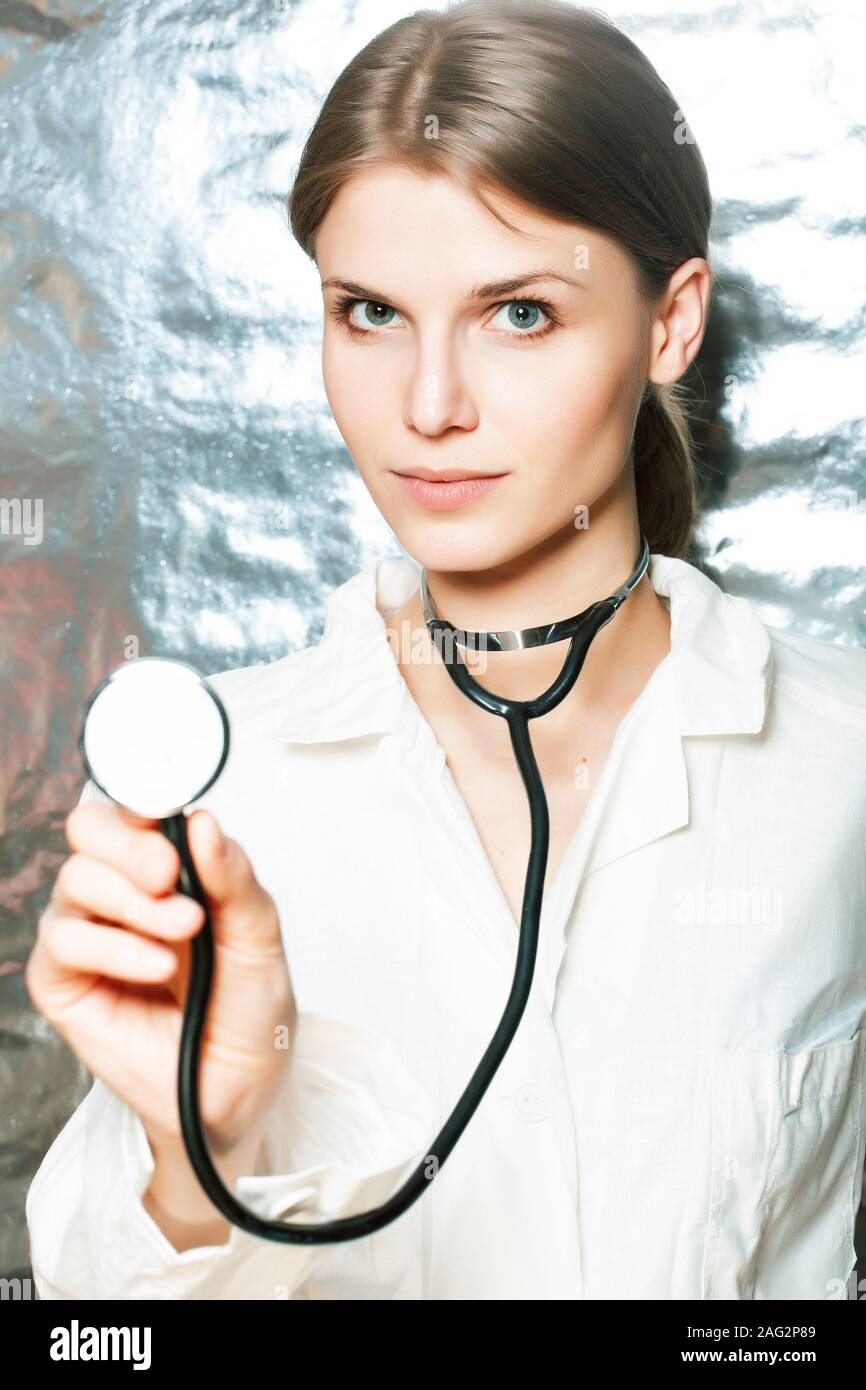 young pretty woman doctor with stethoscope, lifestyle medicine people ...