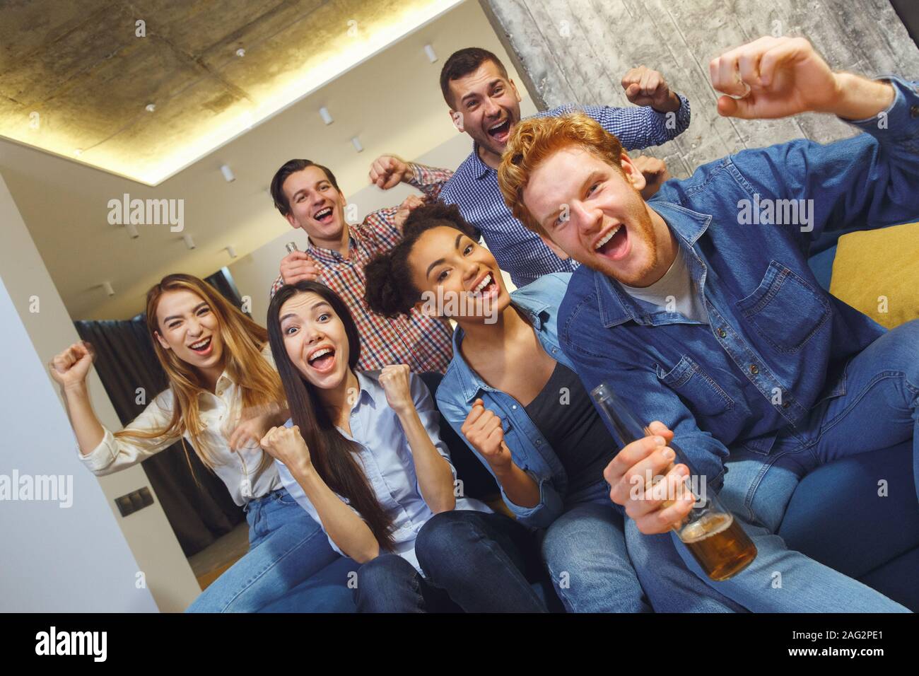 Young women cheering for team hi-res stock photography and images - Alamy