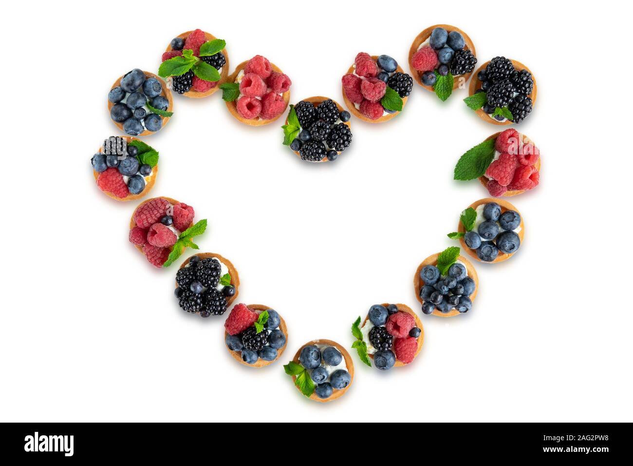 Useful tartlets with blueberries, blueberries, raspberries in the shape ...