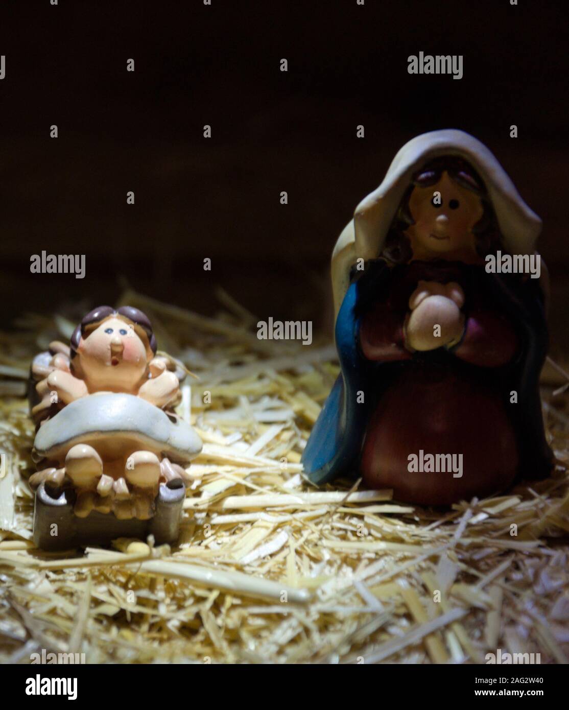 Christmas nativity scene of baby Jesus in the manger. Statuettes ...