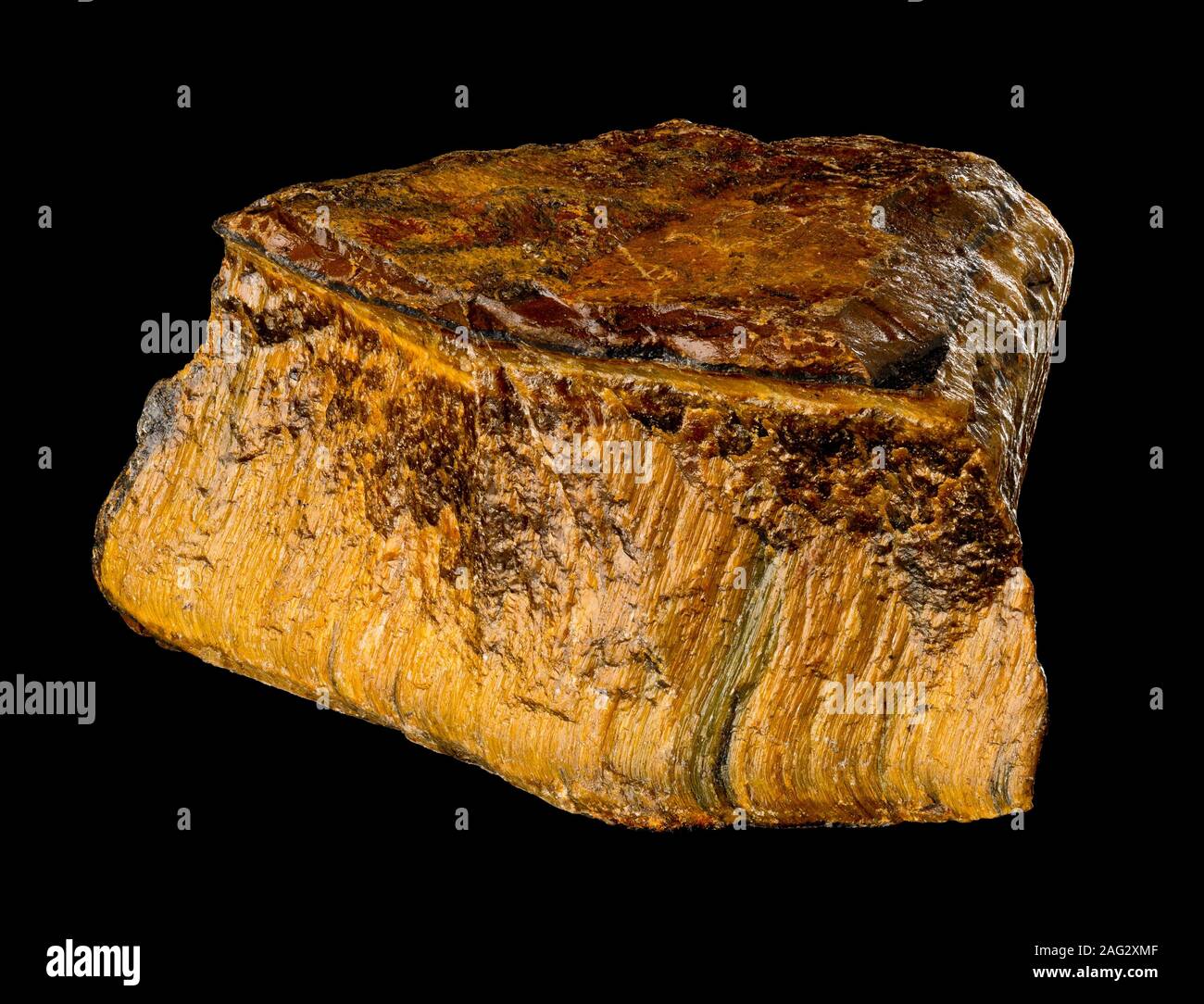 Raw, uncut tiger's eye (also called tiger eye) mineral isolated on ...