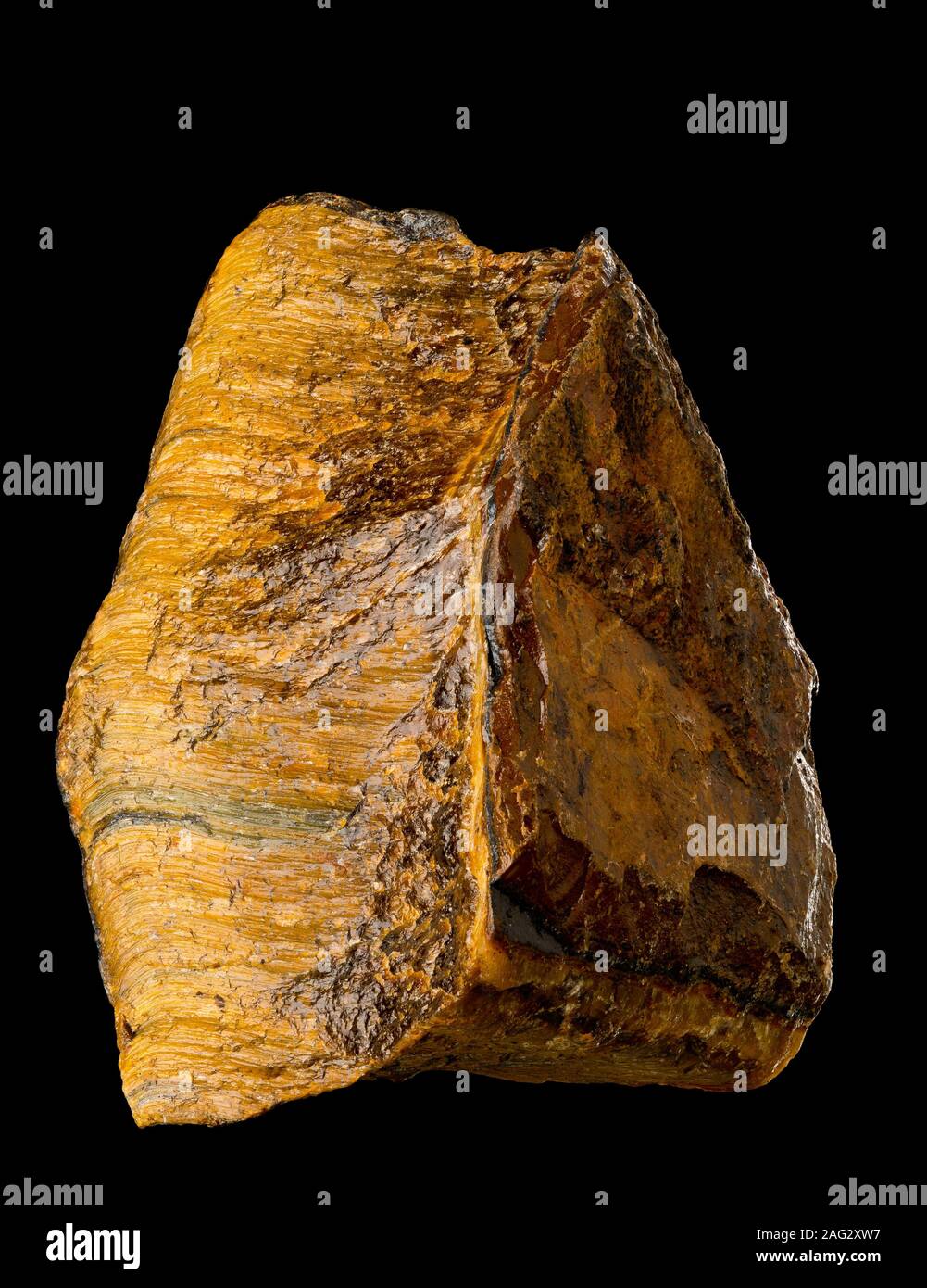 Raw, uncut tiger's eye (also called tiger eye) mineral isolated on ...