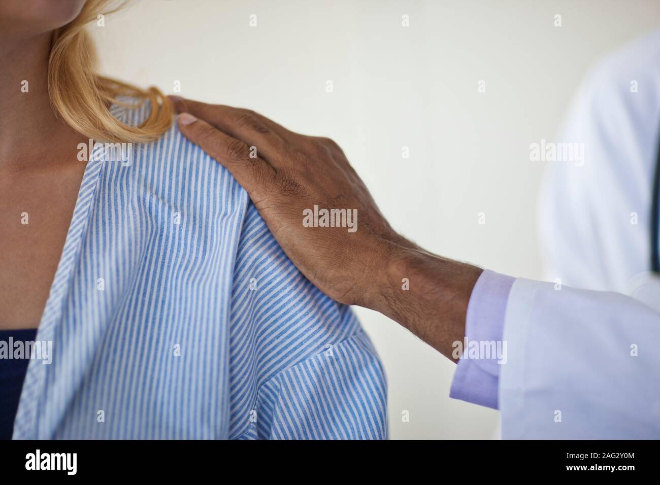 Male has hand on females shoulder hi-res stock photography and images ...