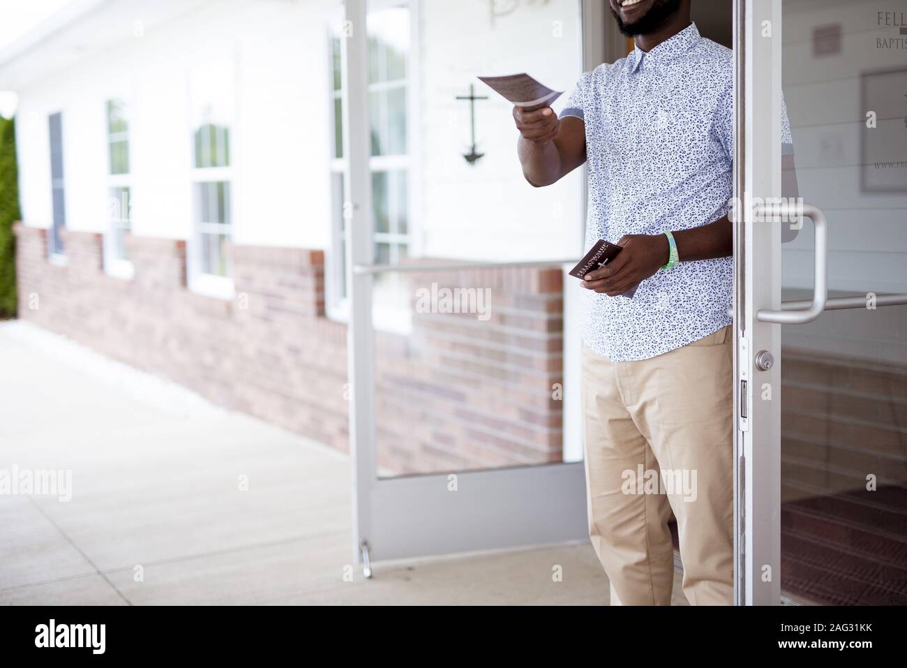 Giving out flyer hi-res stock photography and images - Alamy