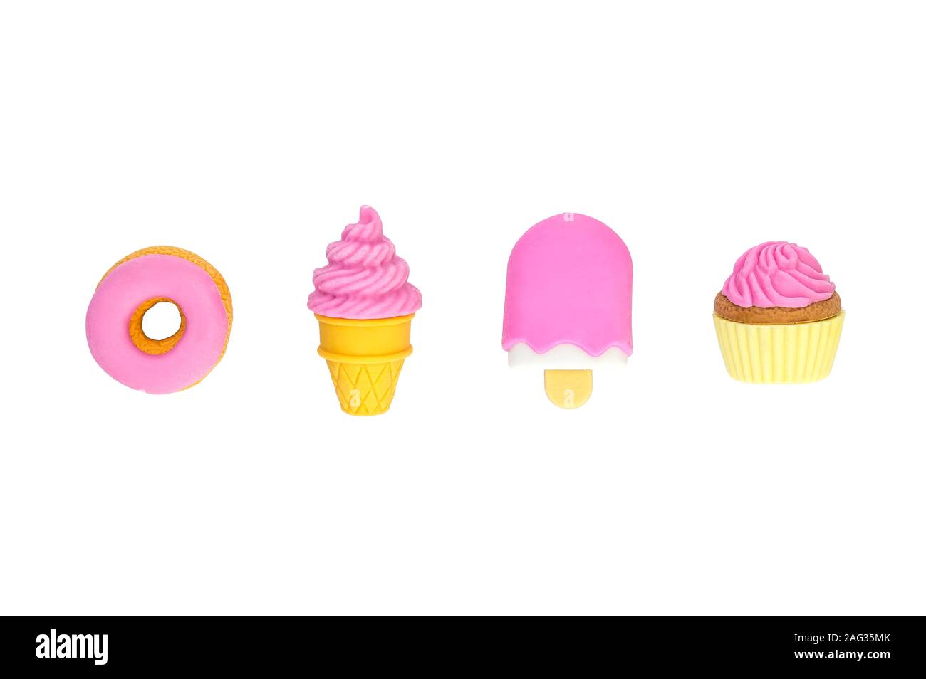 Different toy sweets in miniature with soft shadows close-up isolated ...