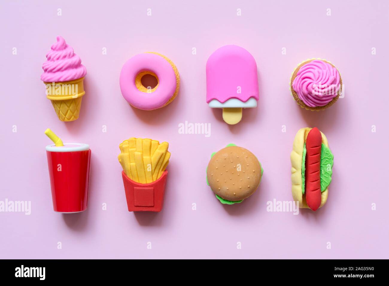 A variety of toy fast food and different sweets in miniature with ...