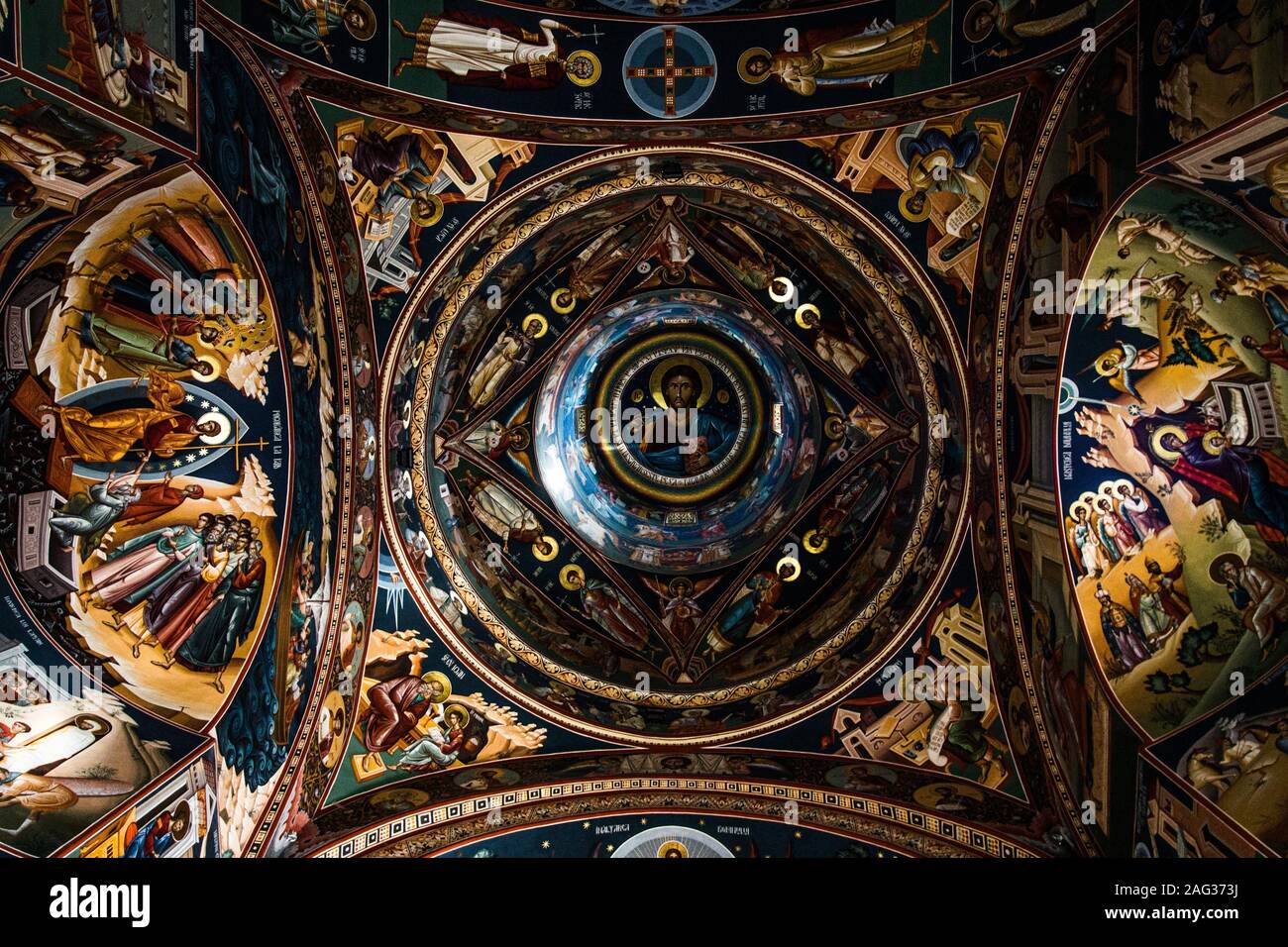 Low angle shot of a temple ceiling with wall art of religious ...