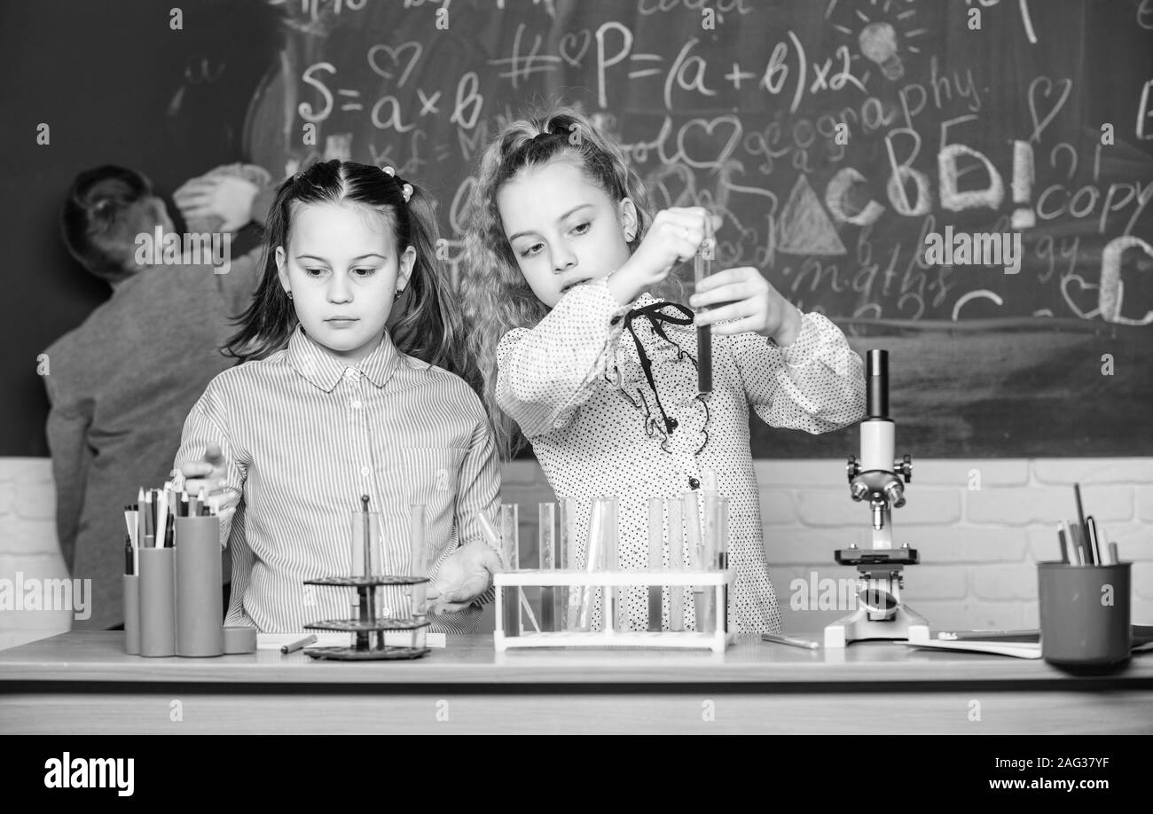 Lab microscope. students doing biology experiments with microscope ...