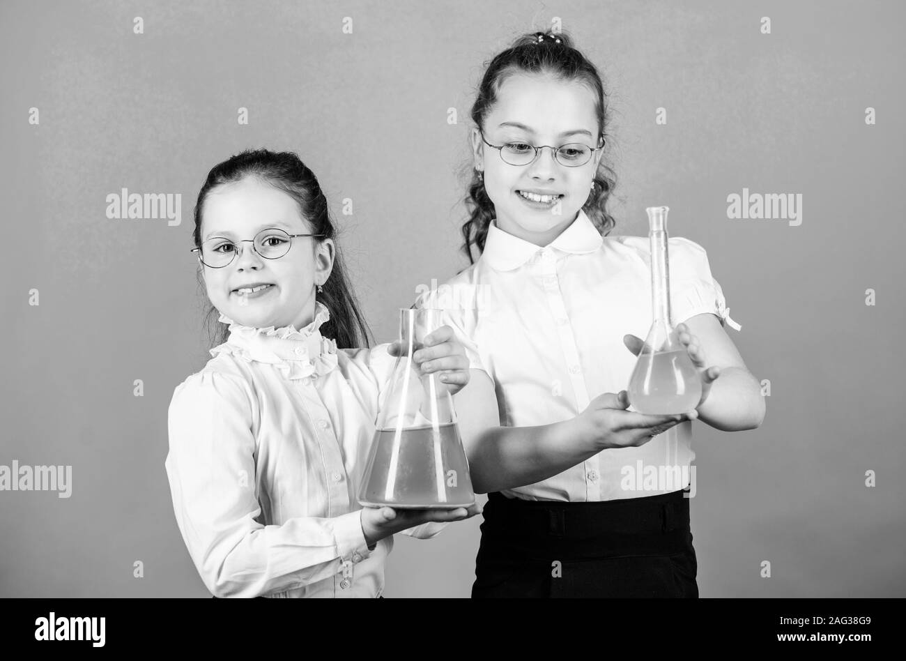 Small kid study. Chemistry lesson. Having fun with chemistry. Educative ...