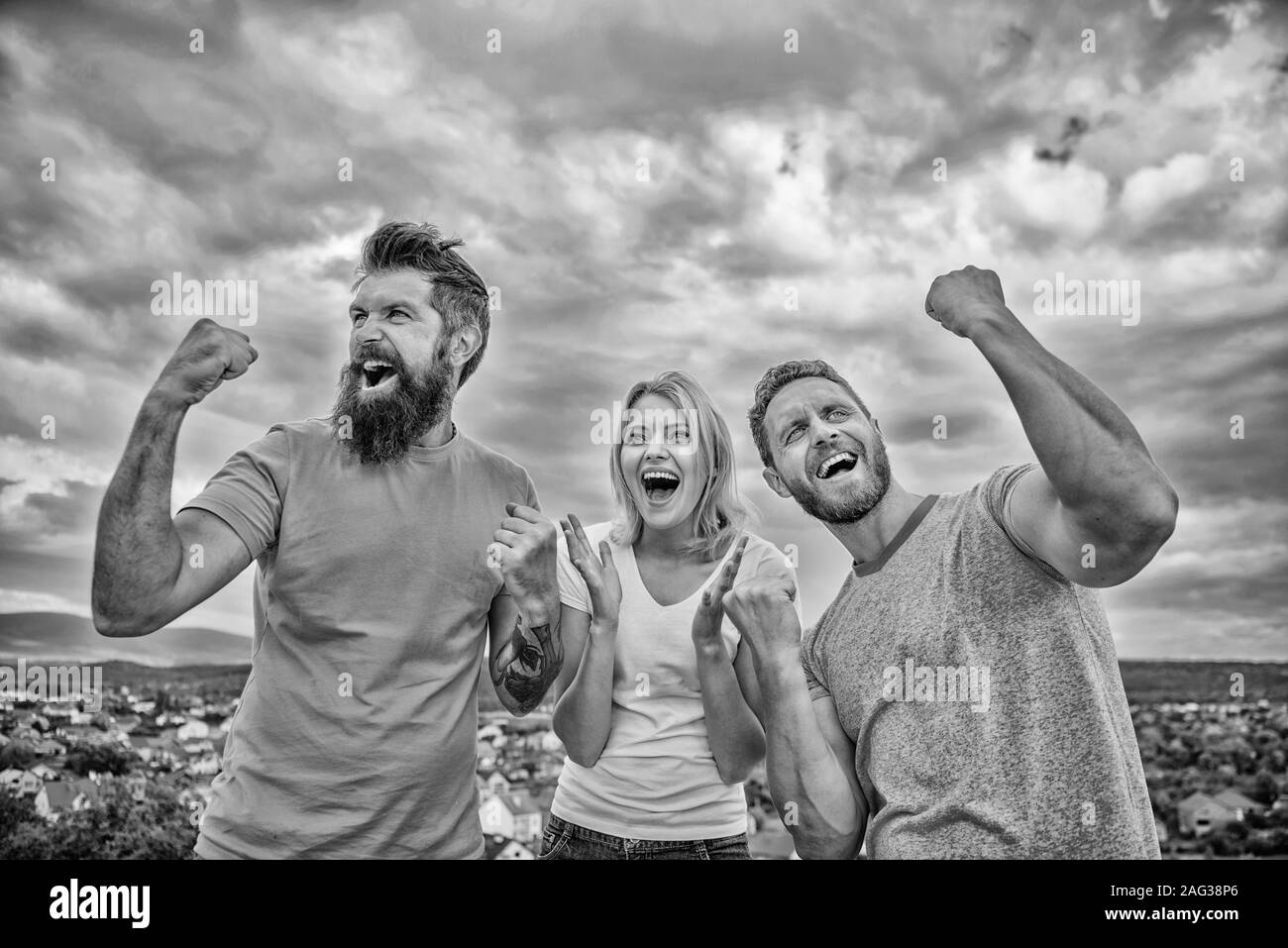 Woman and men look emotional successful celebrate victory sky ...