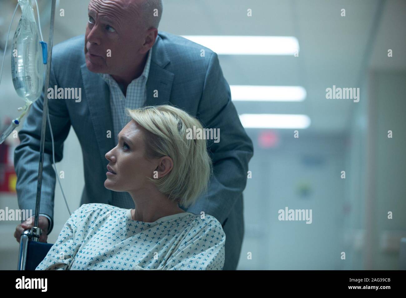 TRAUMA CENTER, from top: Bruce Willis, Nicky Whelan, 2019. ph: Laura T ...
