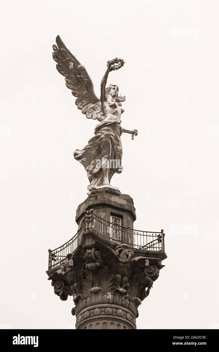 Vertical shot of the historic statue Angel of Independence in downtown ...