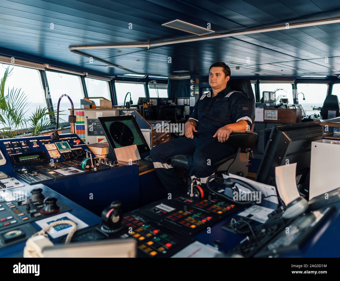Marine navigational officer during navigational watch on Bridge . Work ...