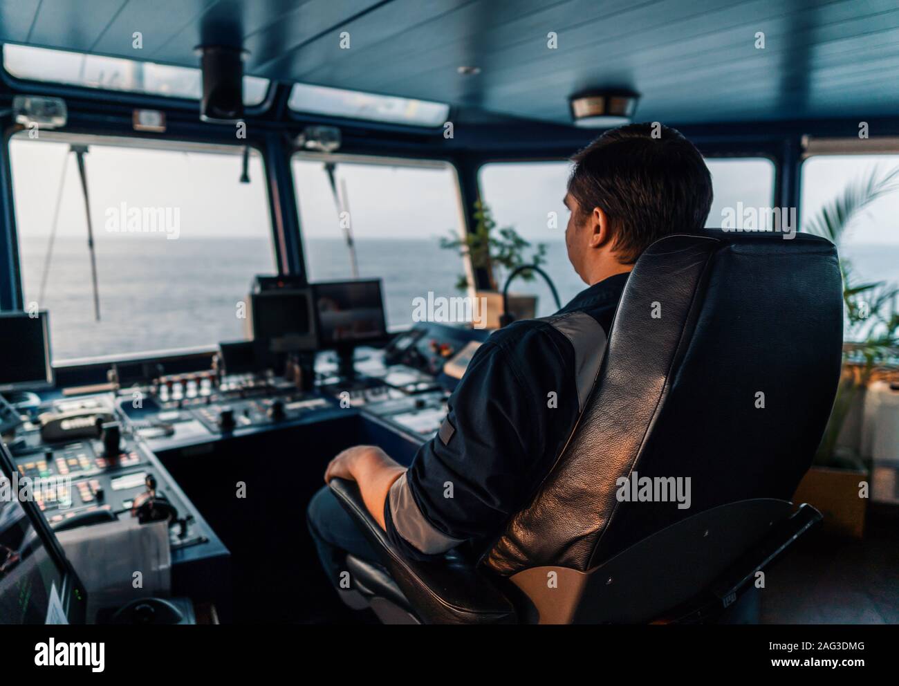 Marine navigational officer during navigational watch on Bridge . Work ...