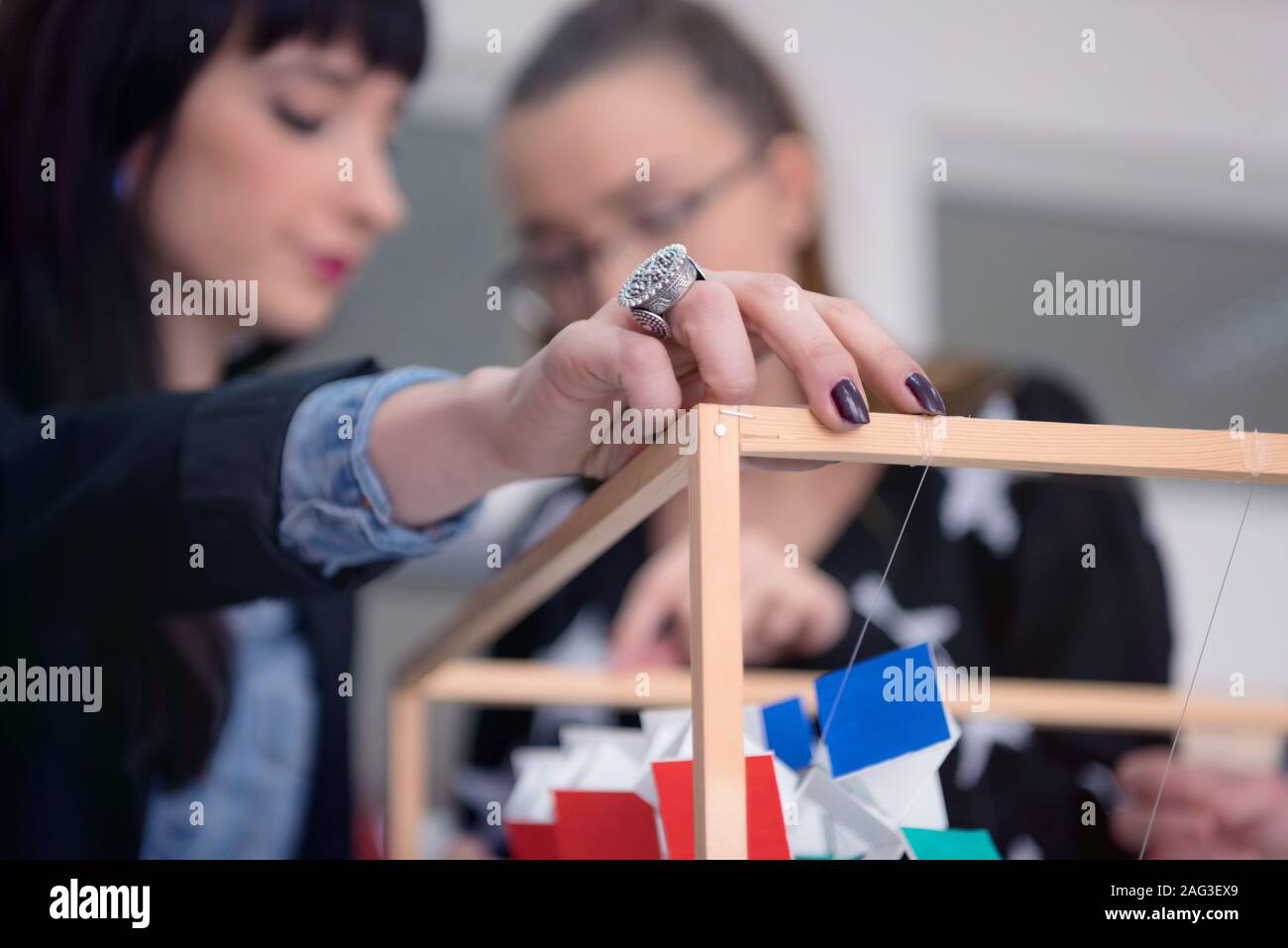Female Architecture teacher at work. Female professor explain ...