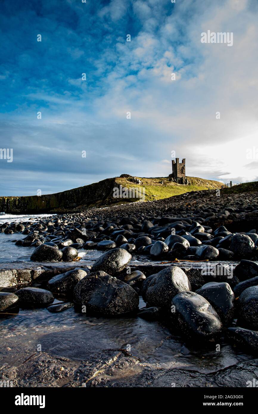 Dunstanburgh Castle, Northumberland, England, UK at low tide Stock ...