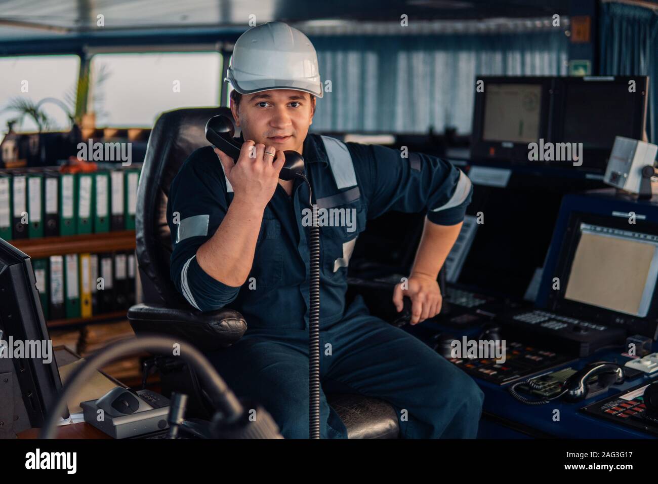 Marine navigational officer during navigational watch on Bridge . Work ...
