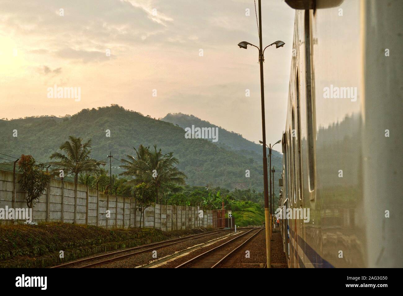 Shot of hills and trees taken from a train window Stock Photo - Alamy