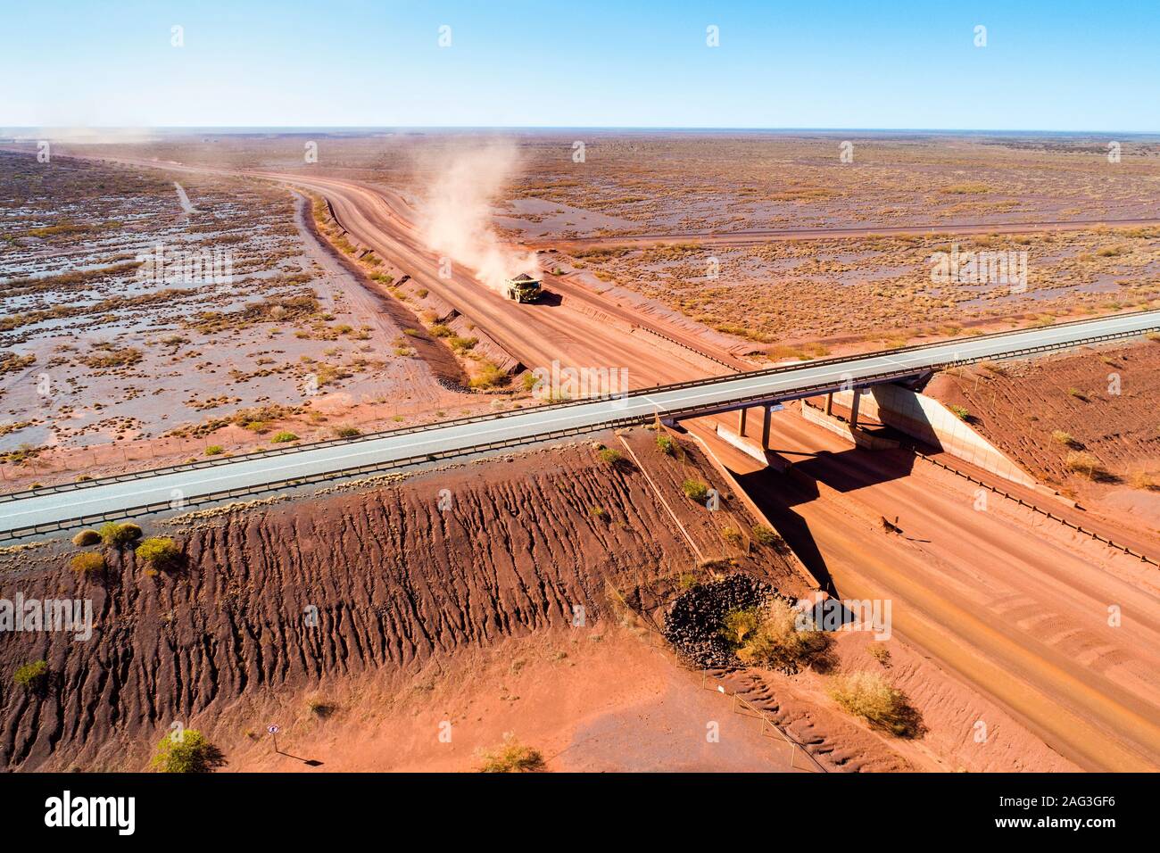 Aerial view of Patterson bridge mining haul road overpass and loaded ...