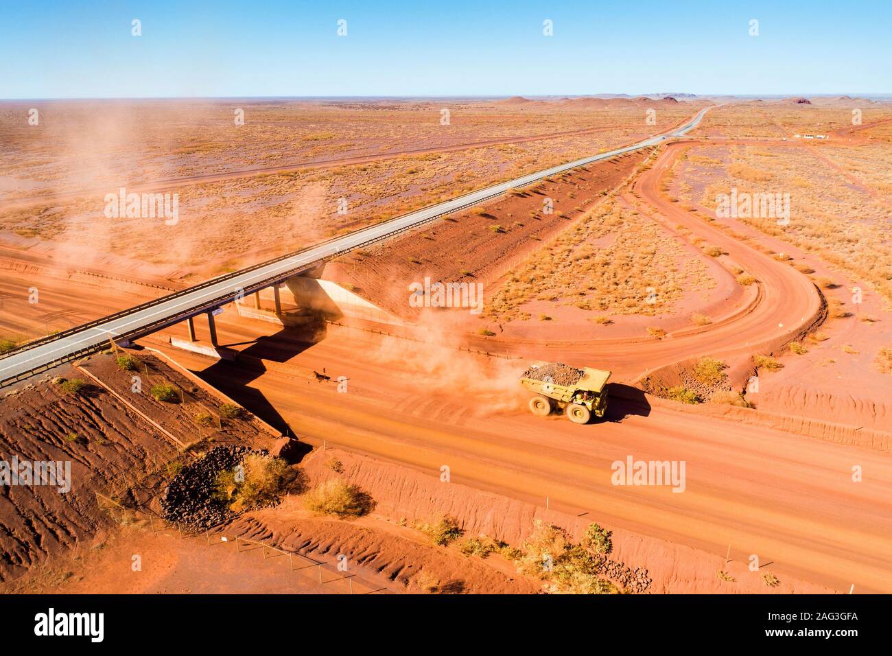 Aerial view of Patterson bridge mining haul road overpass and loaded ...