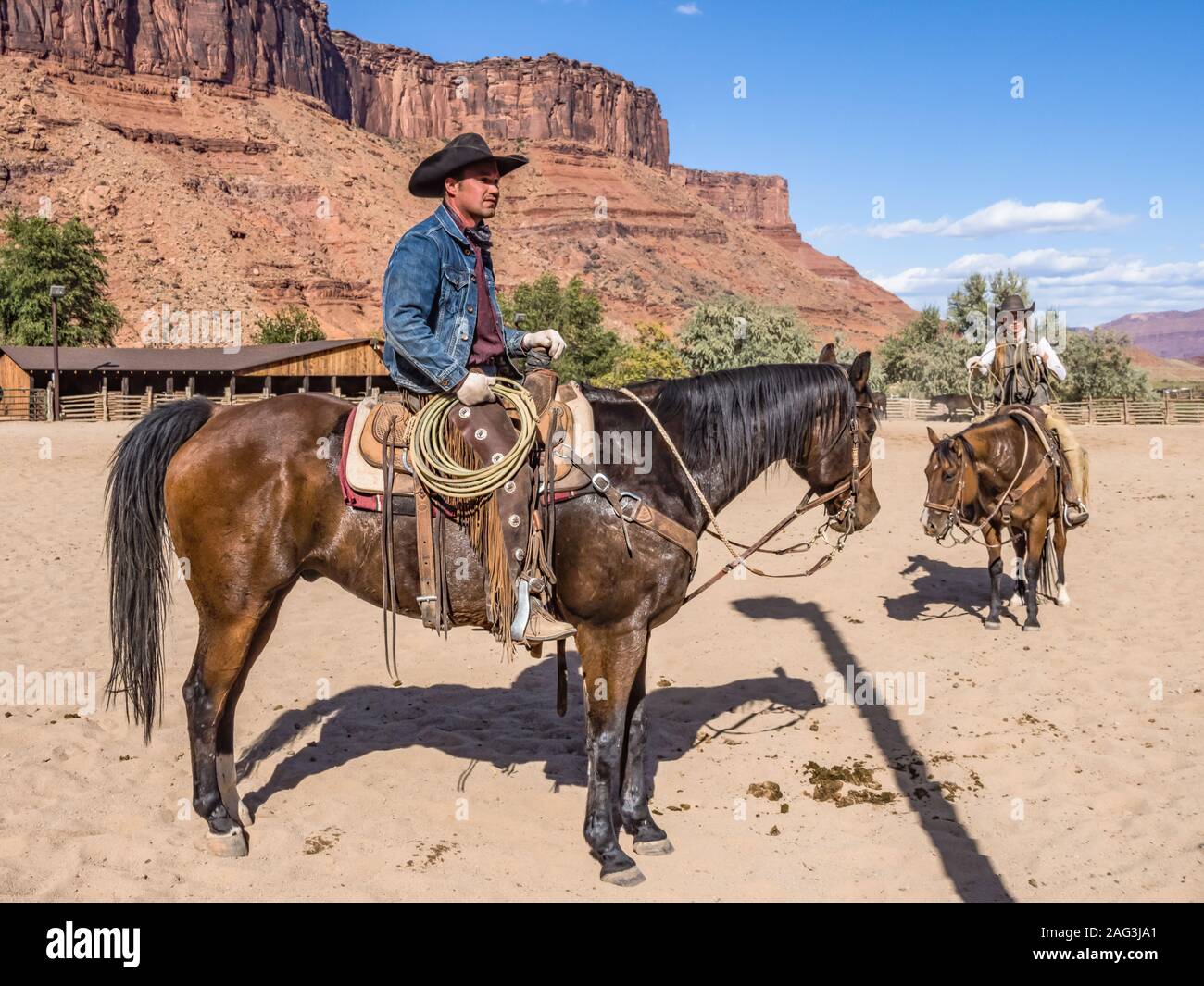 A working cowboy and cowgirl wrangler on a ranch near Moab, Utah ...