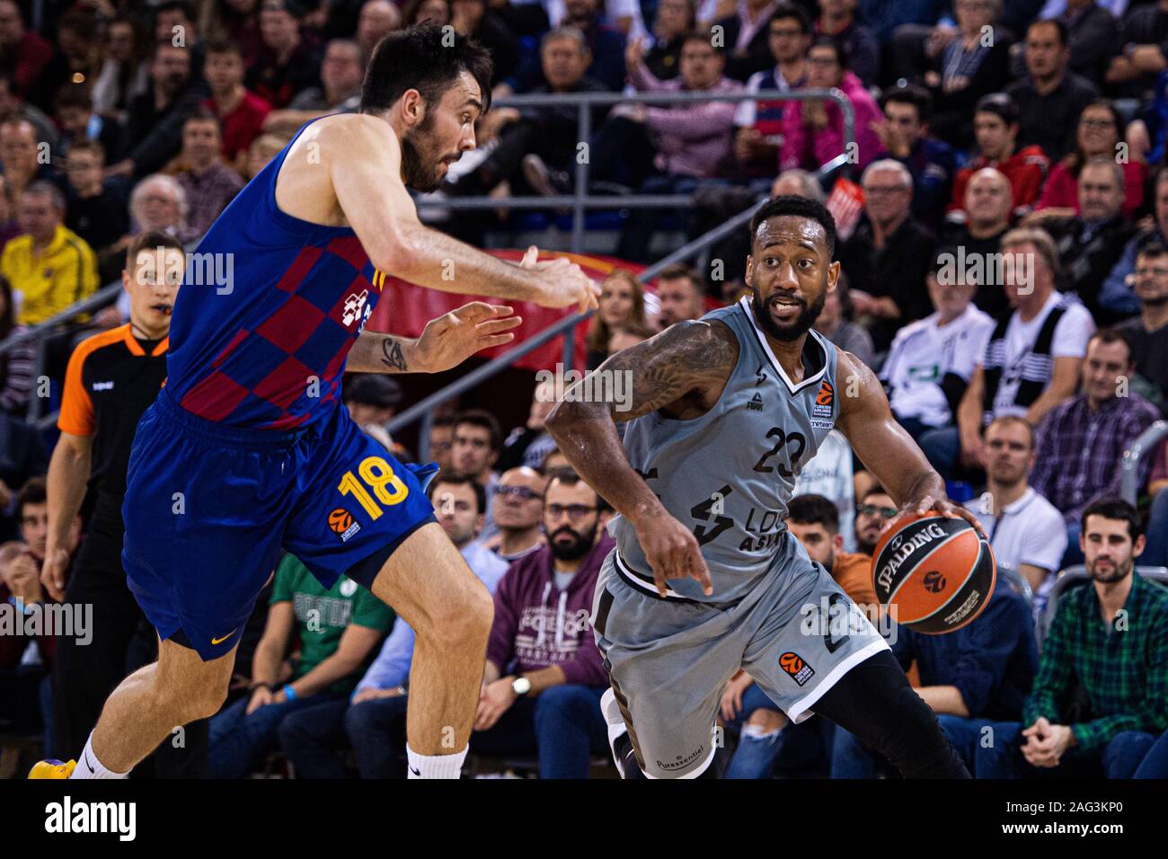 David Lighty of ASVEL, blocked by Pierre Oriola of Barcelona, during ...