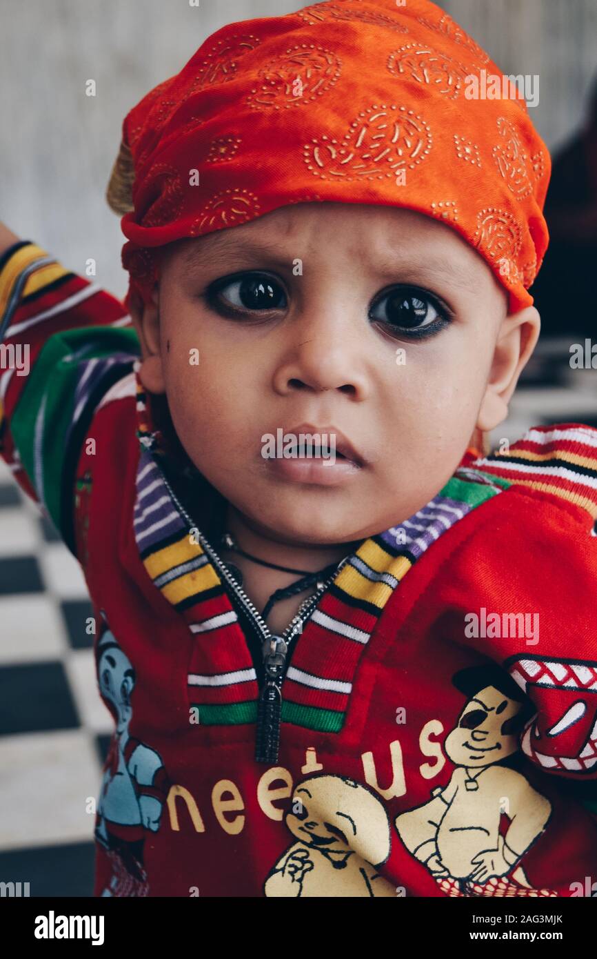 Indian kid with beautiful and big eyes Stock Photo - Alamy