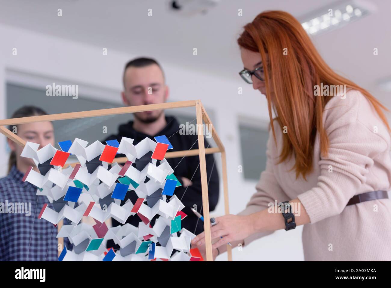 Female Architecture teacher at work. Female professor explain ...