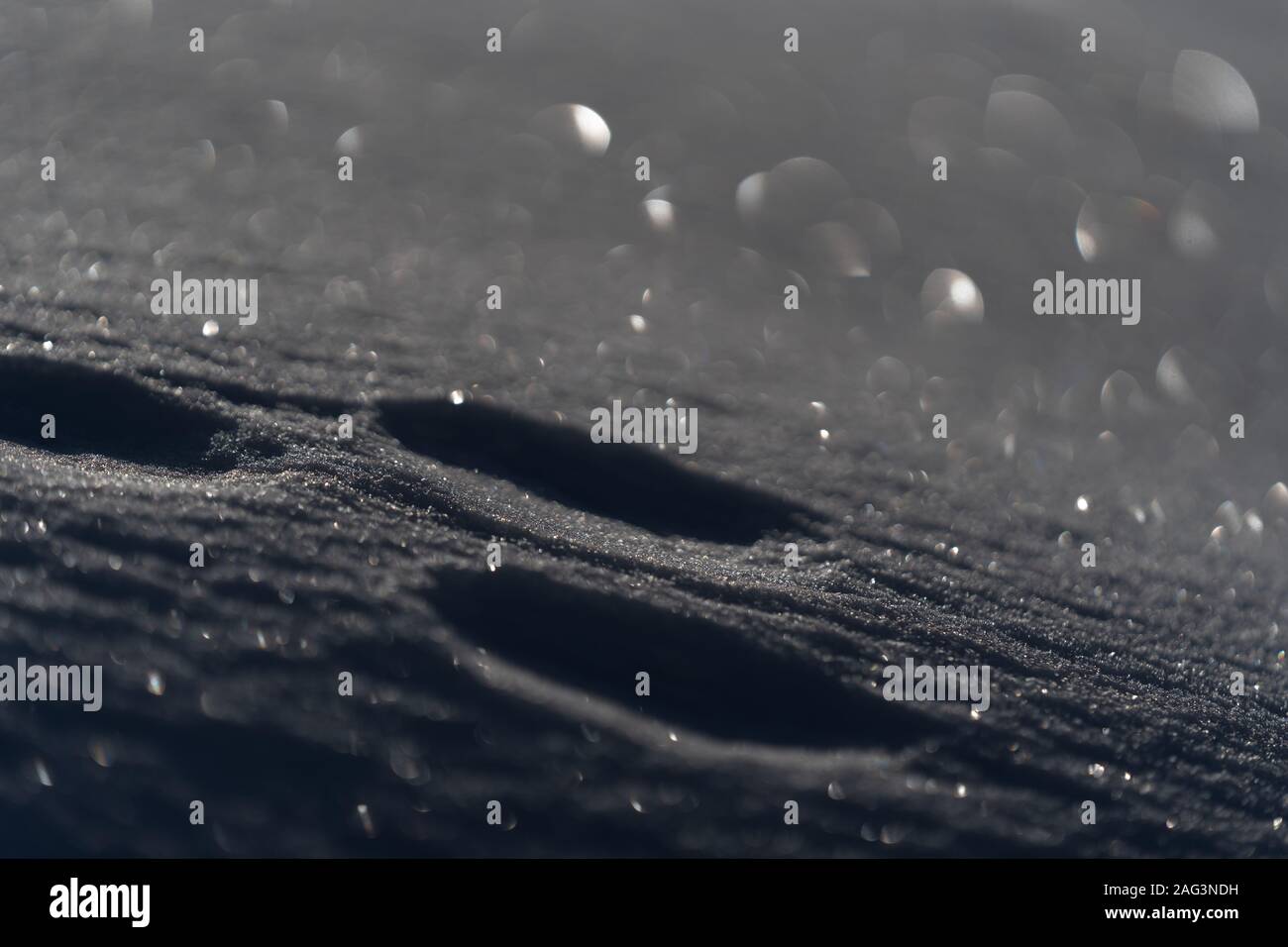 Reflective black desert, starry desert, unknown footprints Stock Photo ...