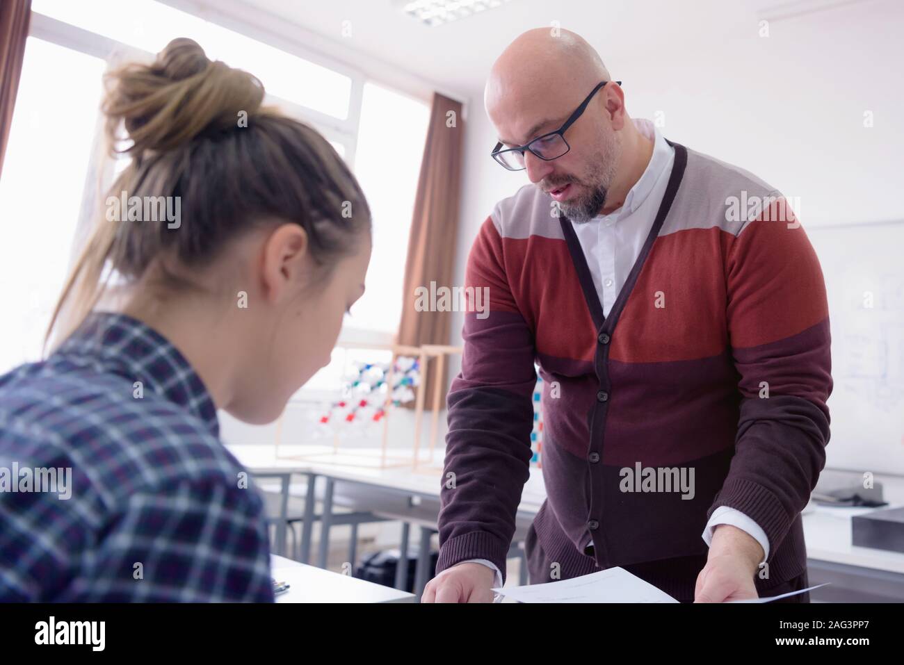 Male professor of architecture explain lesson to multiethnic students ...
