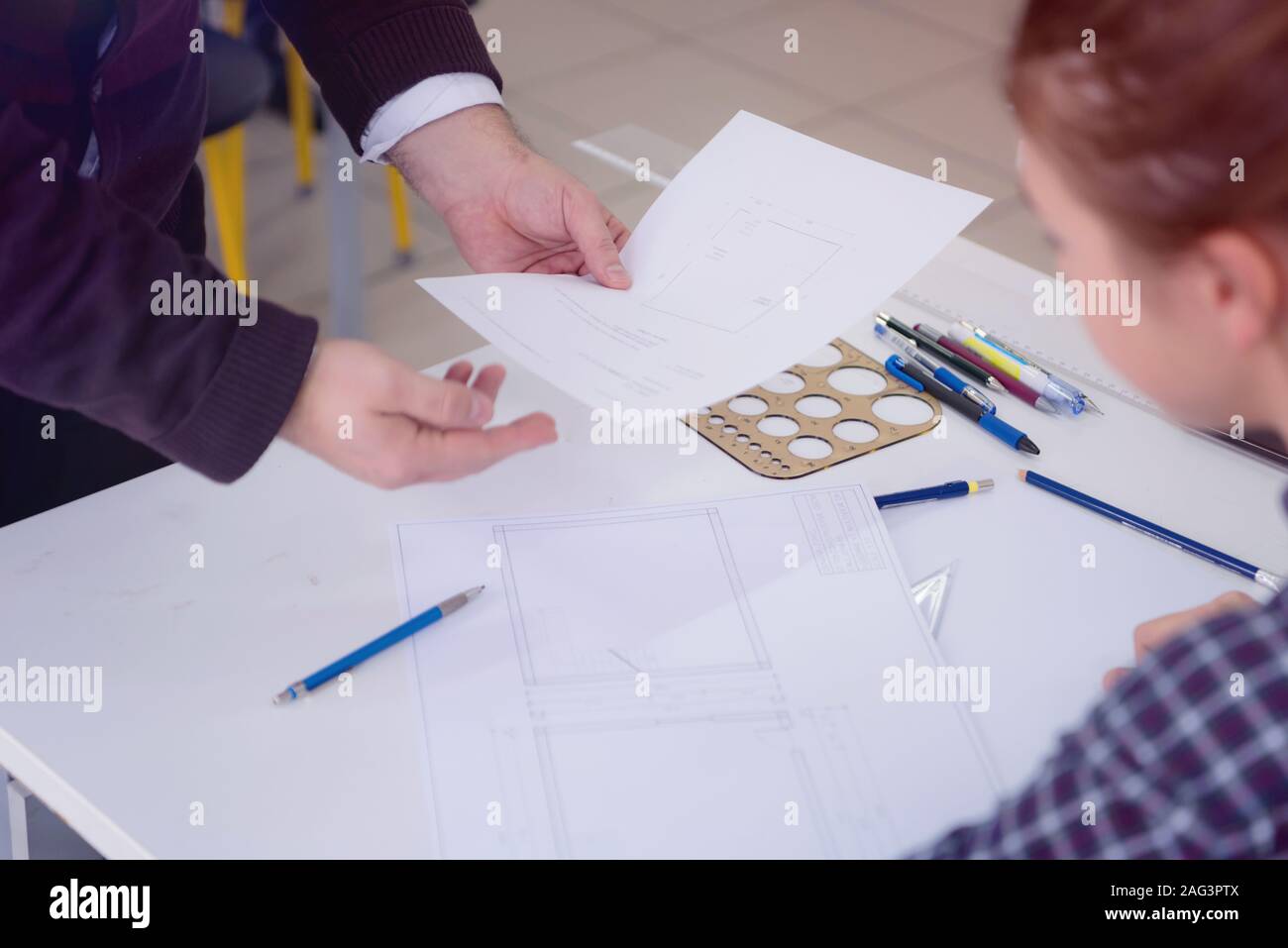 Male professor of architecture explain lesson to multiethnic students ...